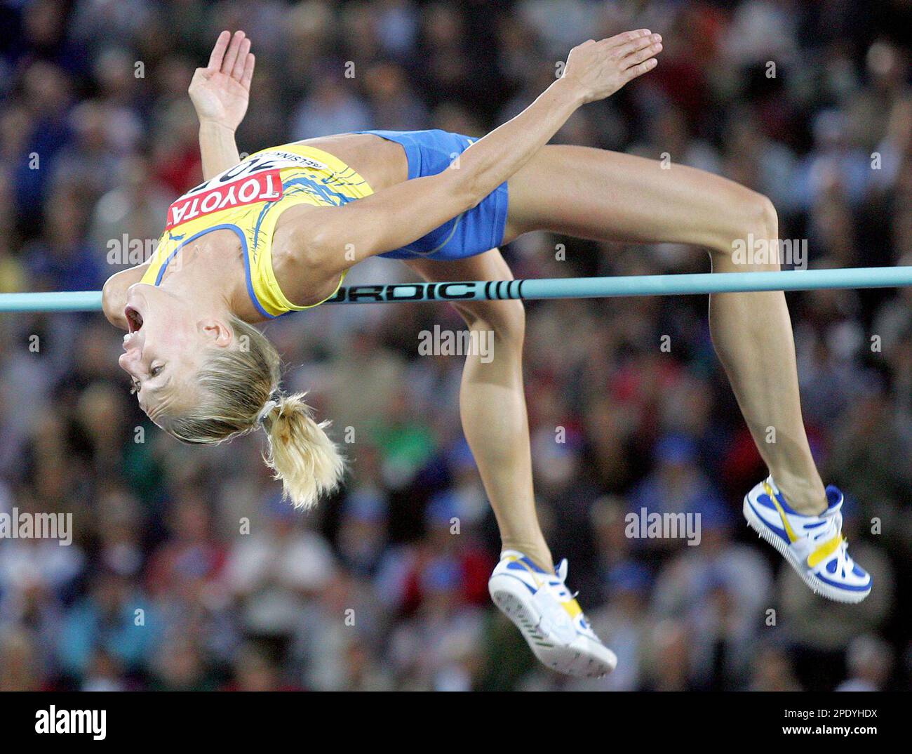 Sweden's Kajsa Bergqvist clears the bar on her way to winning the gold ...