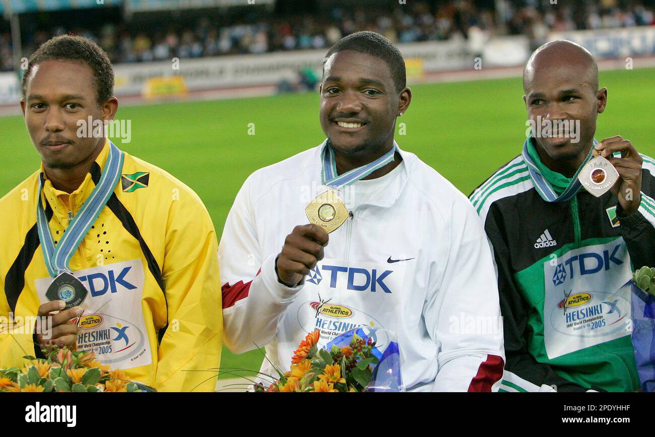 Michael Frater of Jamaica, left, who took the silver medal, left ...