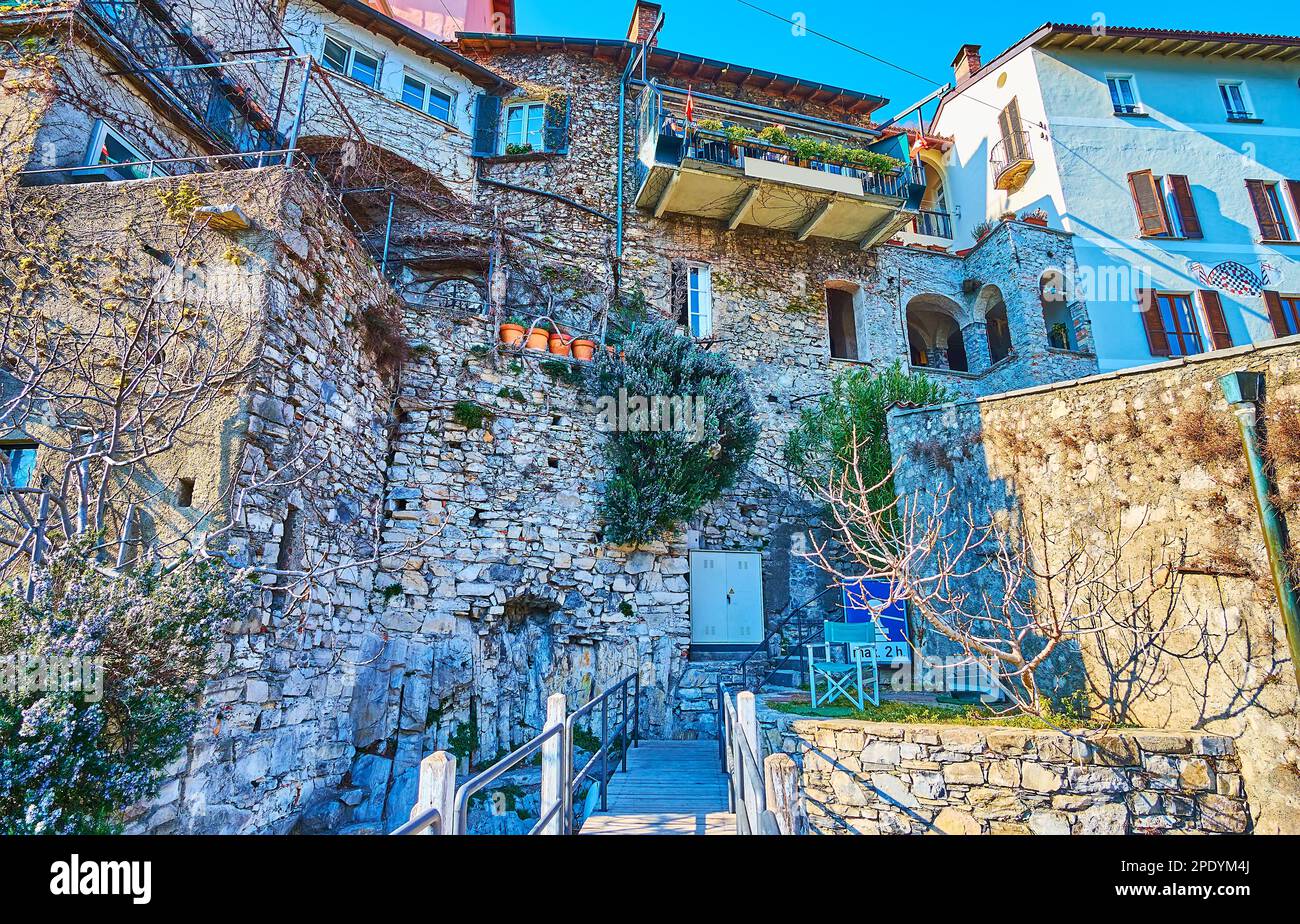 The dense stone housing of the small lakeside village of Gandria ...