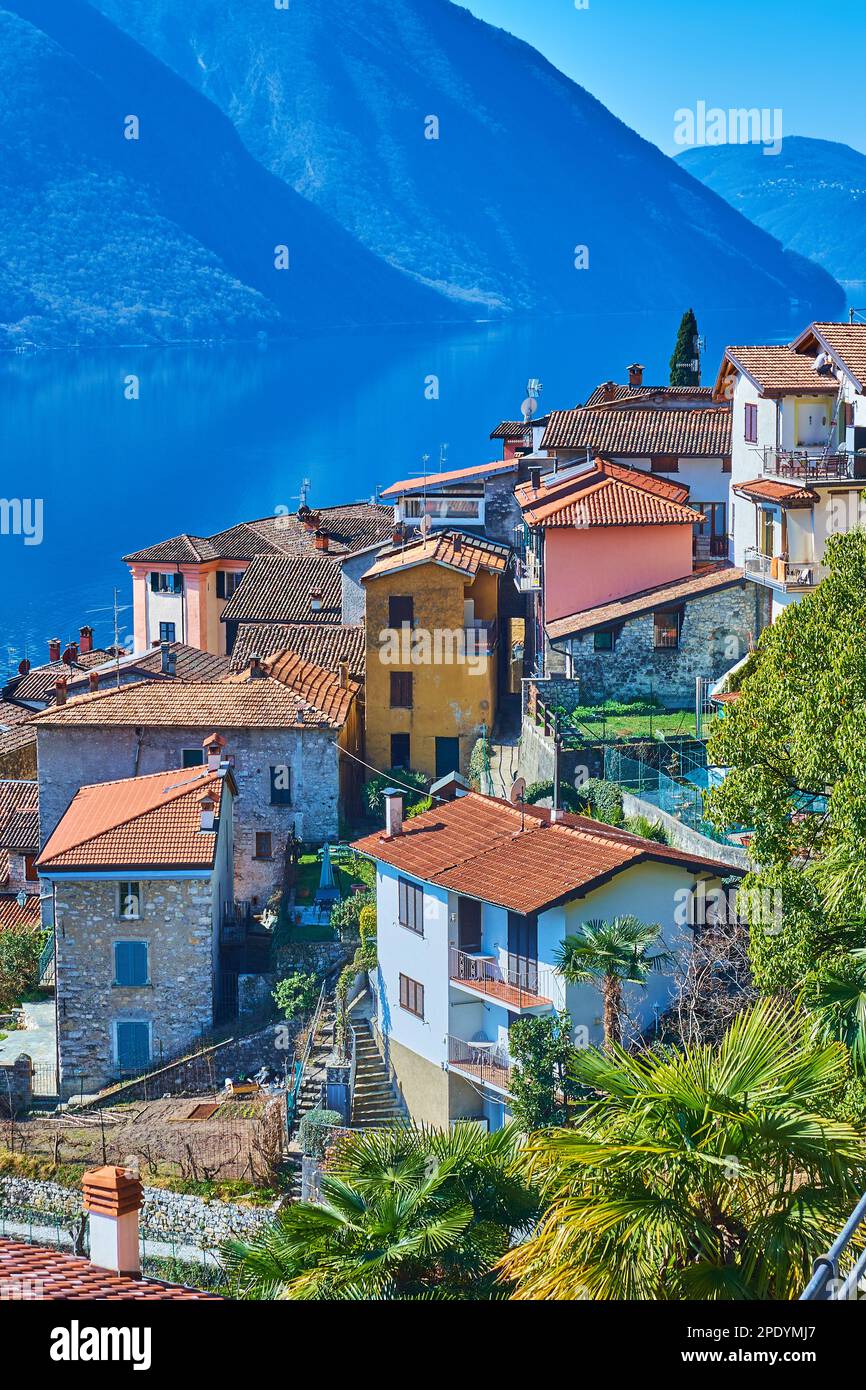 The colored dense housing of Albogasio Inferiore mountain settlement ...