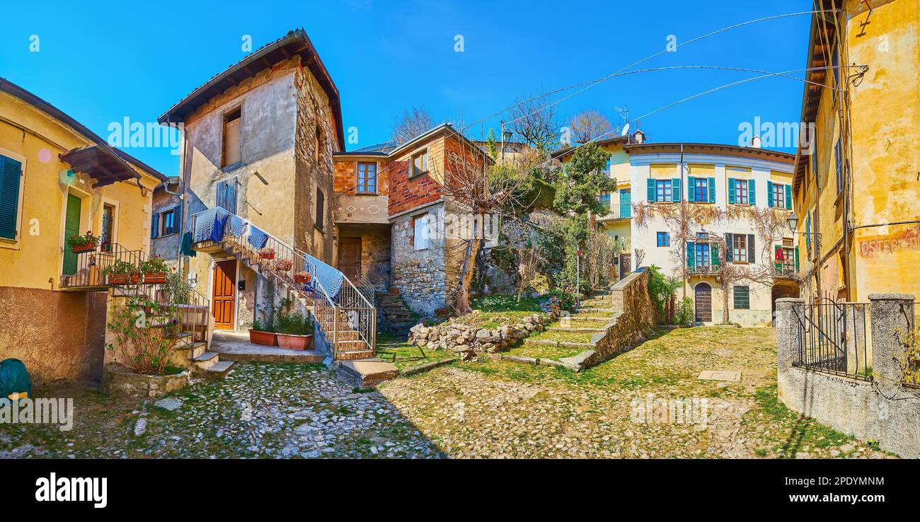Panorama of the medieval Piazza Rusciett with historic houses and ...
