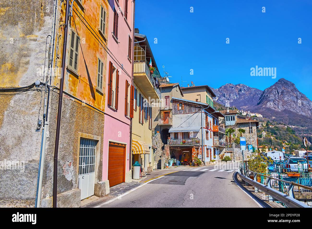 Walk down the embankment of Lake Lugano and enjoy the mountain ...