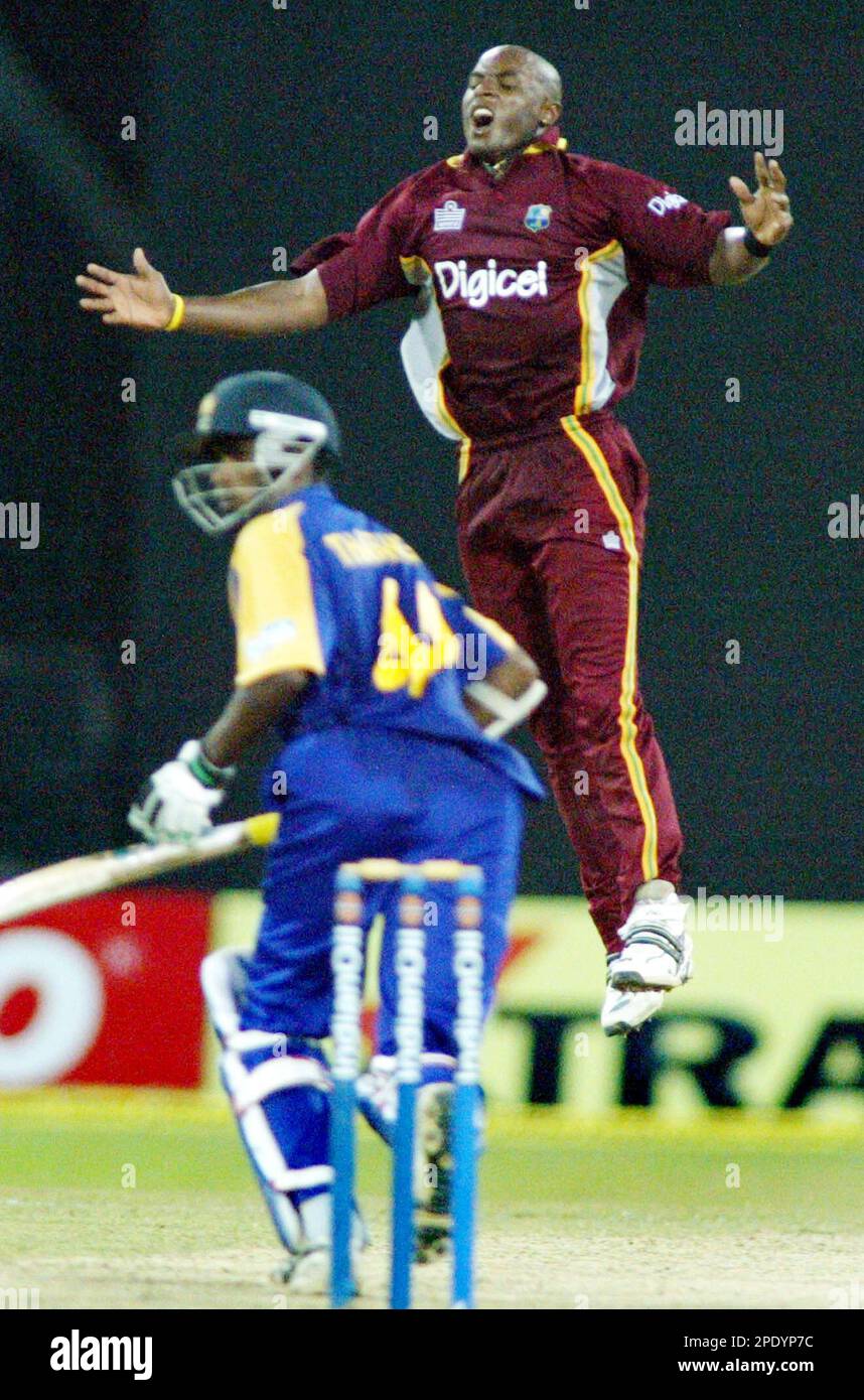 West Indies bowler Deighton Butler, right, reacts as team mate Runako ...