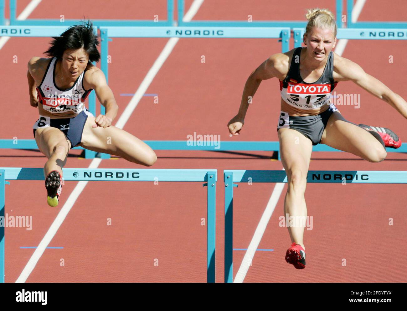 Japan's Yuki Nakata, left, follows Germany's Lilly Schwarzkopf over the ...