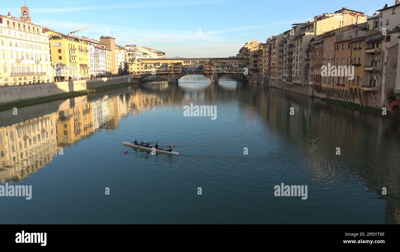 The Ponte Vecchio, old segmental arch bridge with stores and housing ...