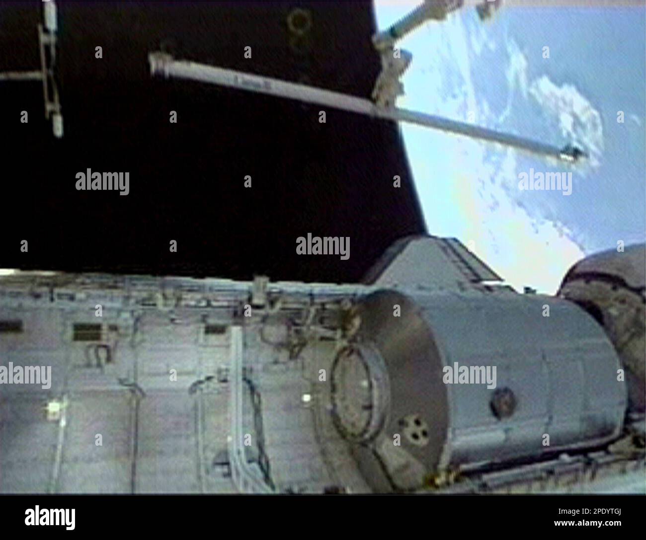 In this image released by NASA TV, a television camera on the ...