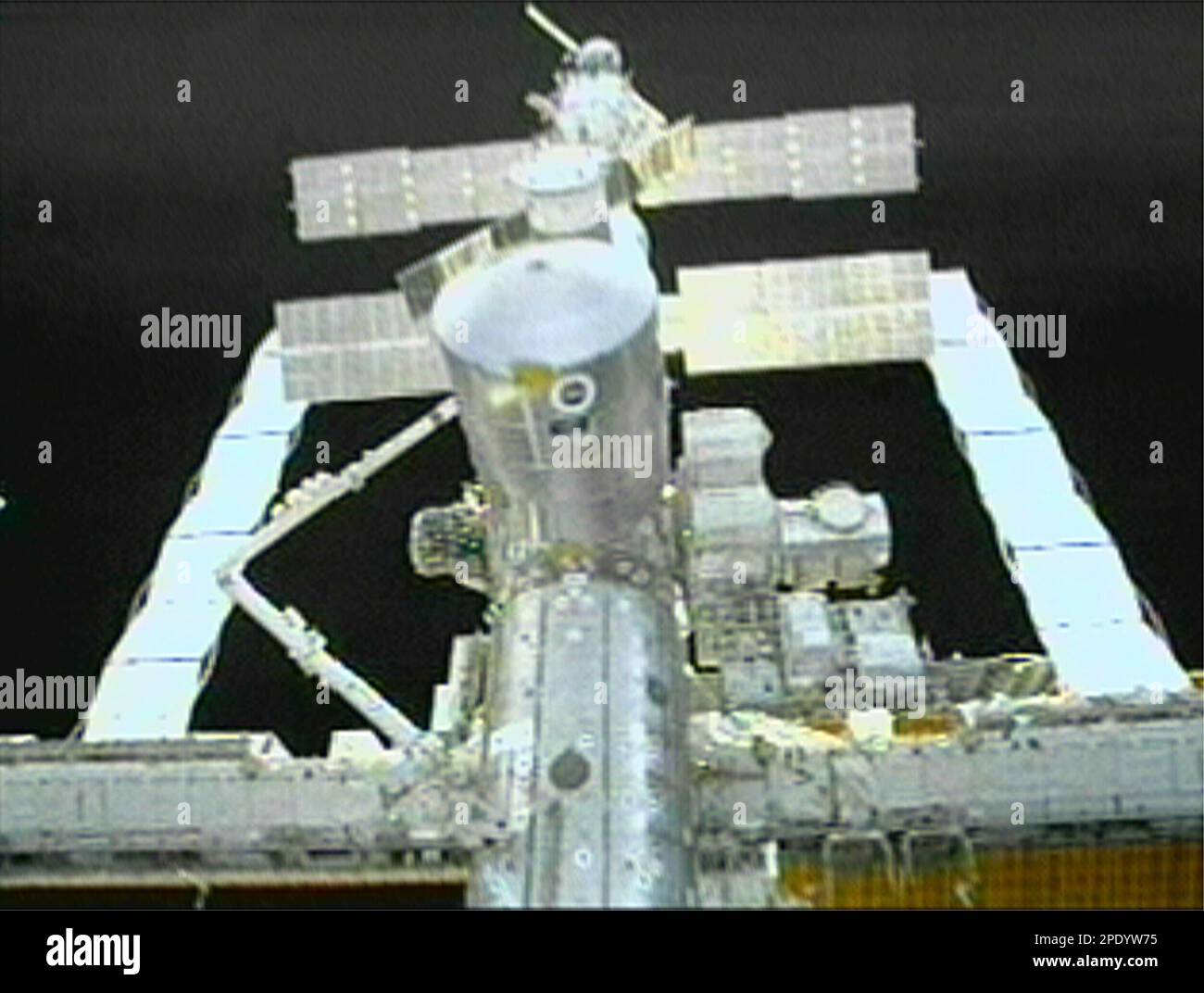 A television camera shows the robot arm attached to the Raffaello cargo ...