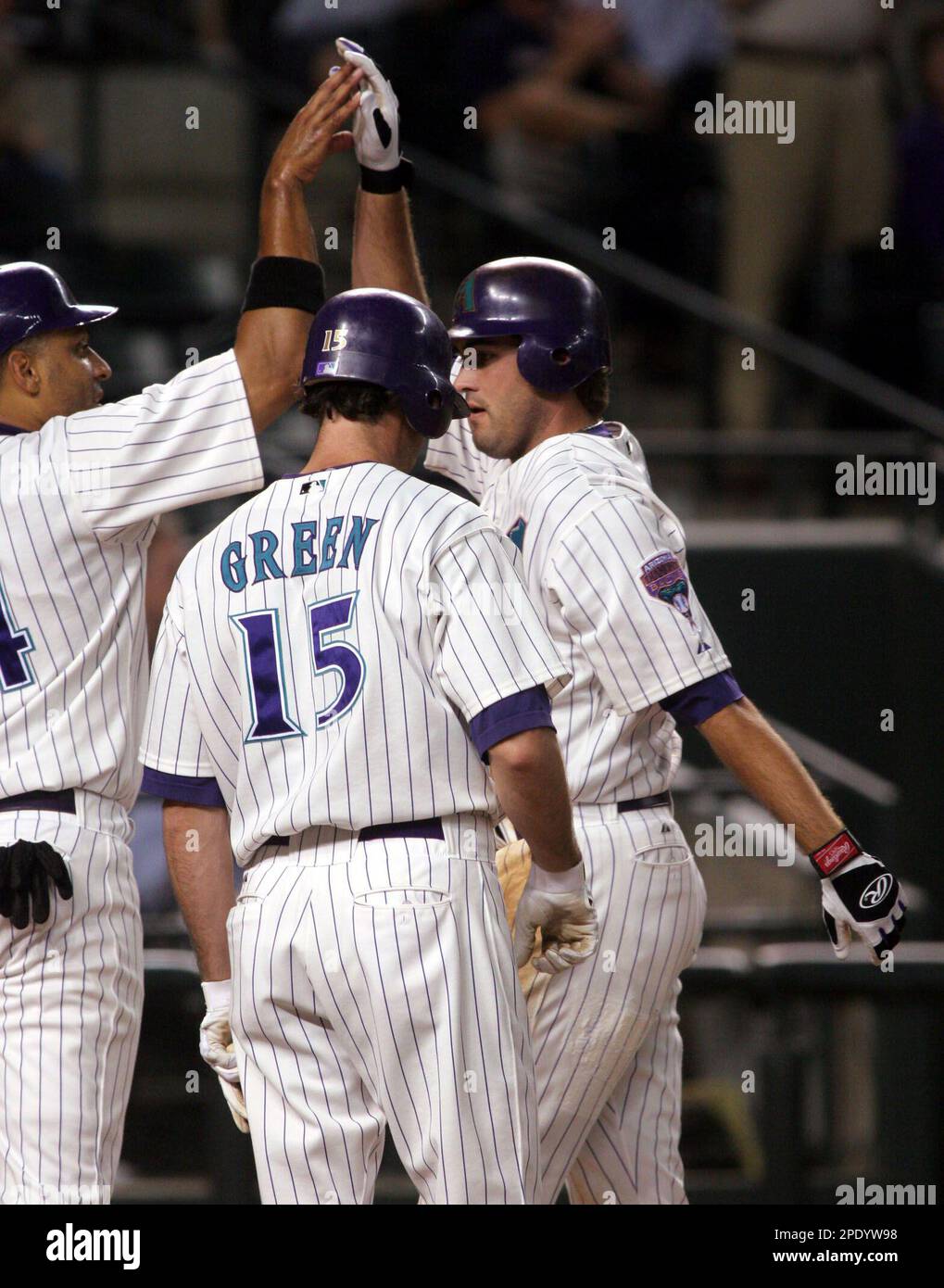 Arizona Diamondbacks' Troy Glaus, right, is congratulated by teammates ...