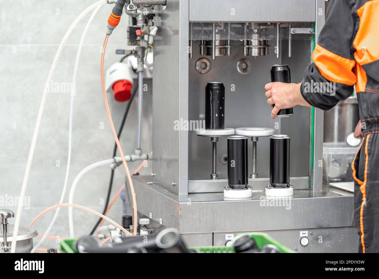 beer filled beverage cans in a brewery Stock Photo - Alamy