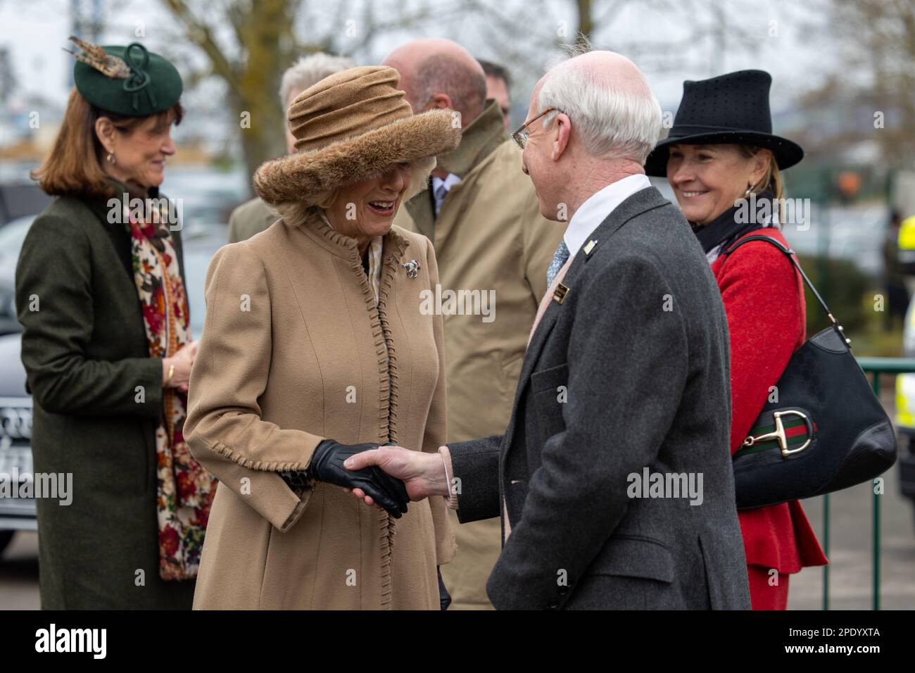 The Queen Consort, with Ian Renton, as she arrives at the Cheltenham ...