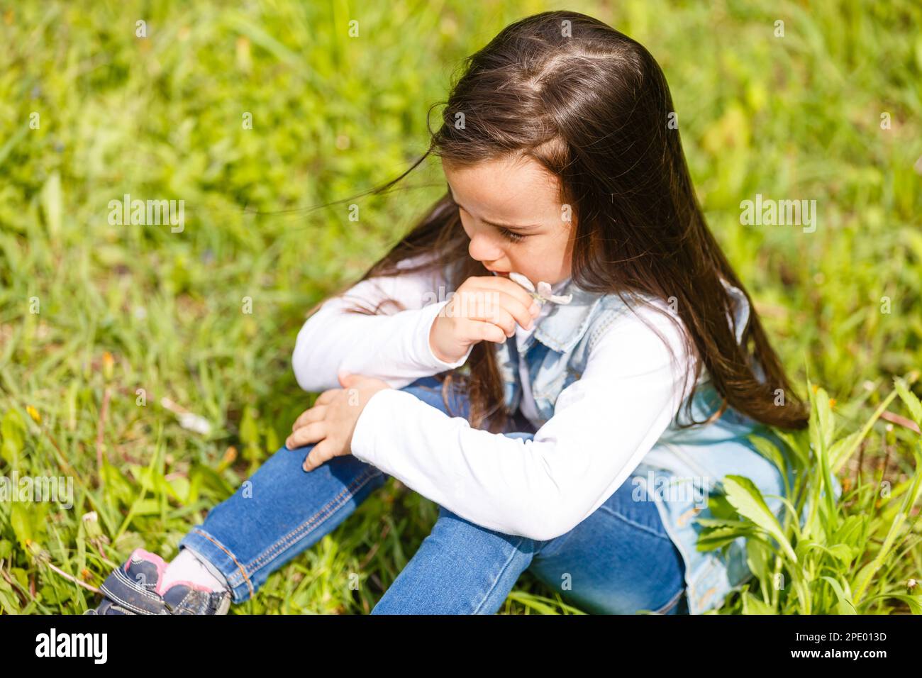 Beautiful sad little girl crying, on summer background Stock Photo - Alamy
