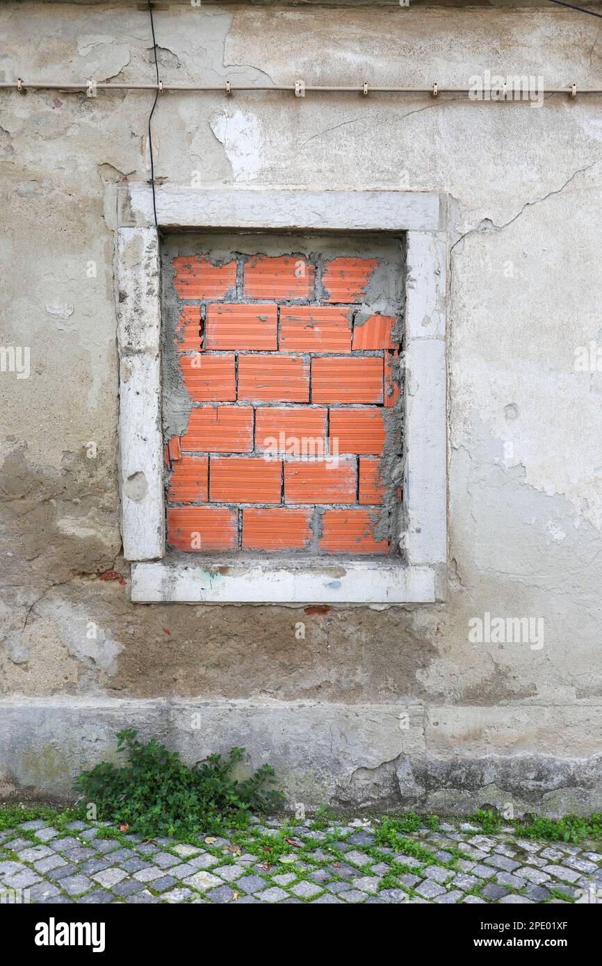 Window bricked up with red bricks of abandoned building Stock Photo - Alamy