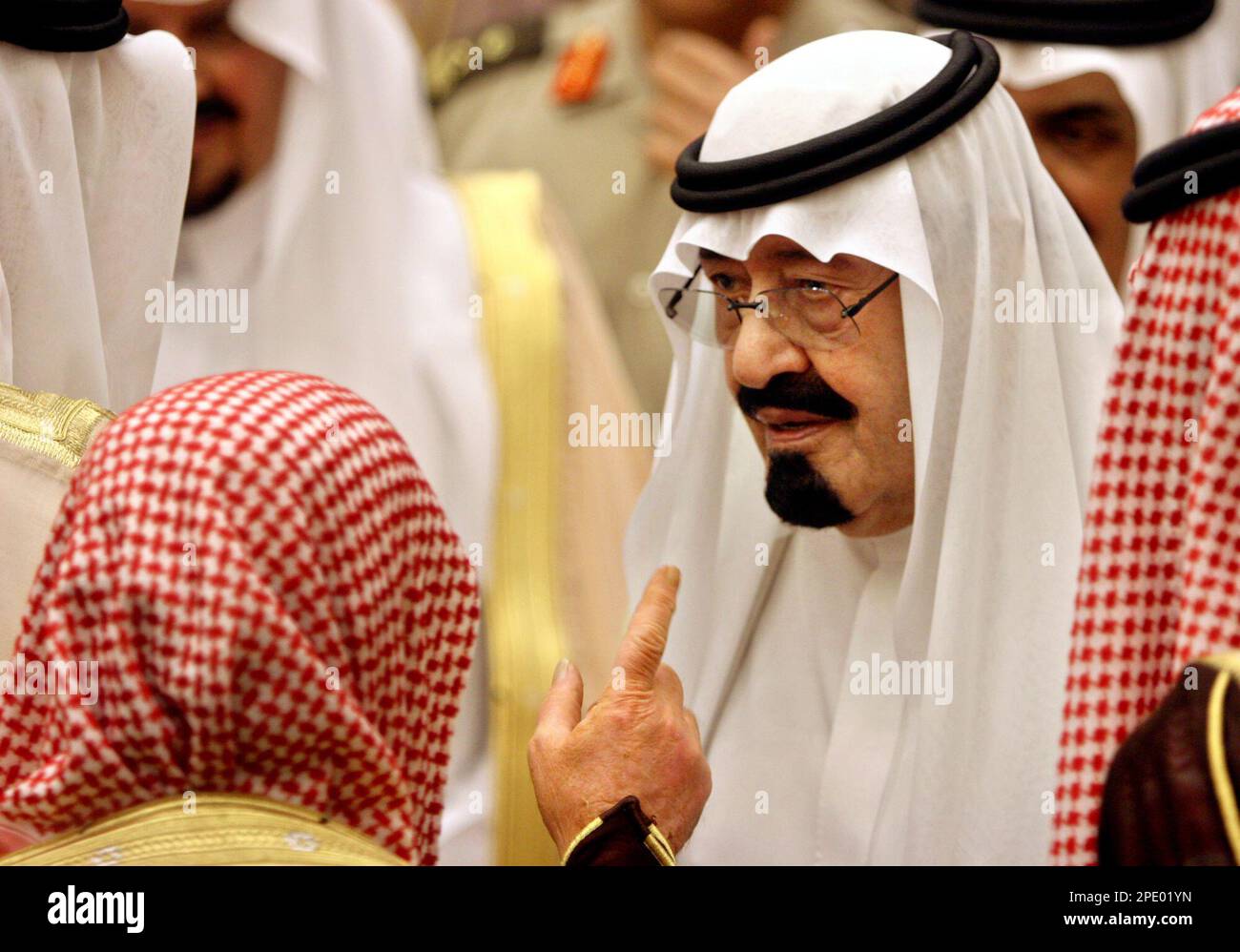 Saudi new King Abdullah listens to a tribal chief as he receives oaths ...