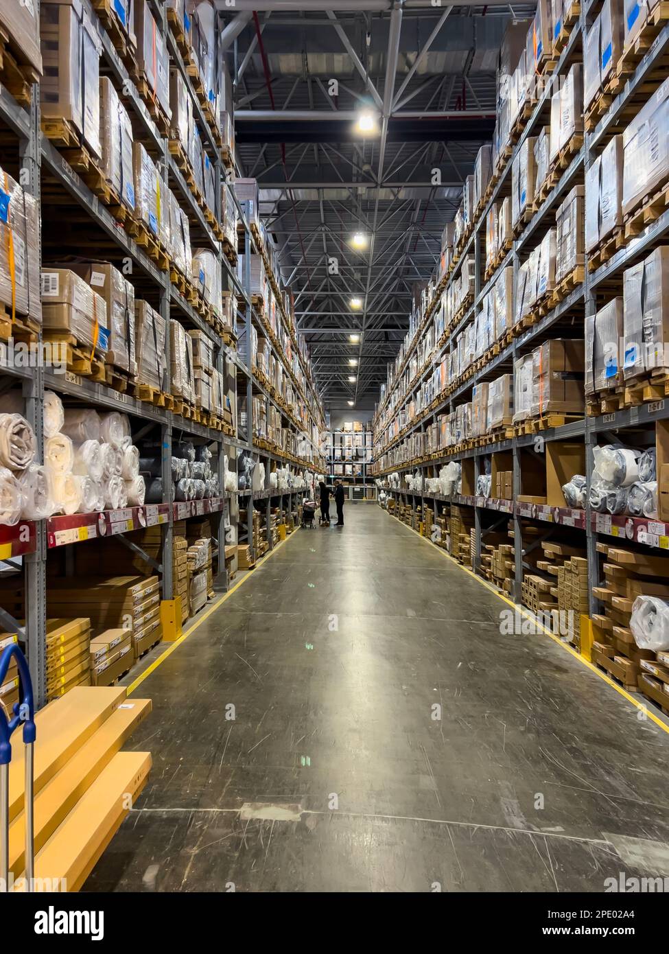 A couple in front of a pallet rack at Ikea Istanbul, Turkey - 01.18. ...