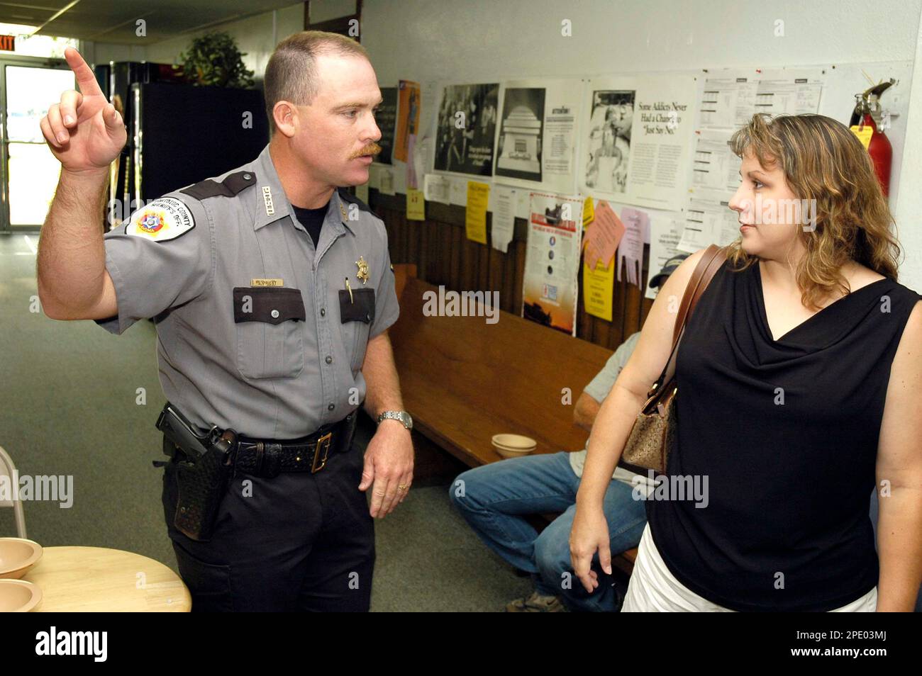 Deputy Justin Priest screens Brandy Bolin for security at the Pontotoc ...