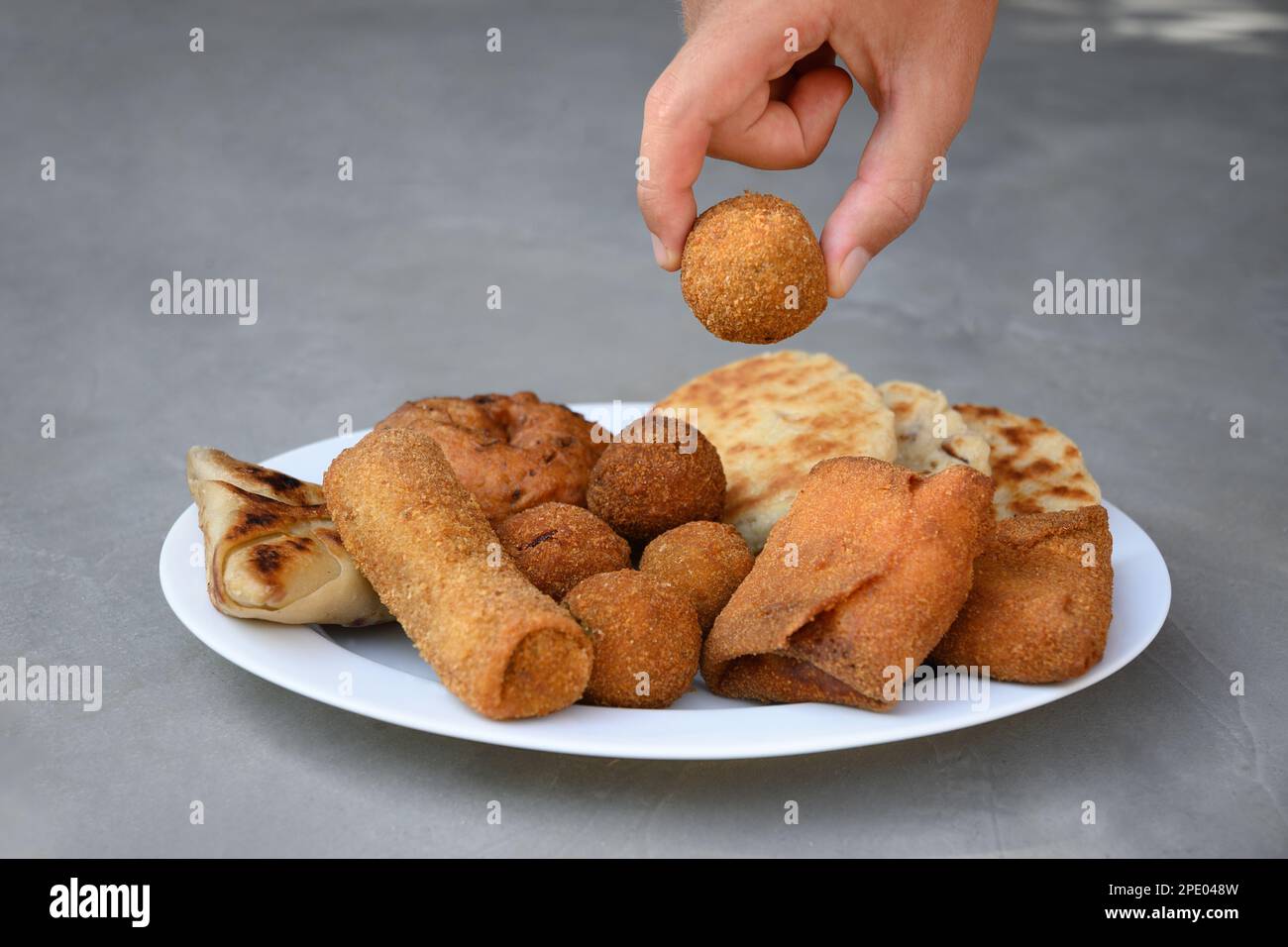 Authentic Sri Lankan different street food, short eats. Vegetable roti ...