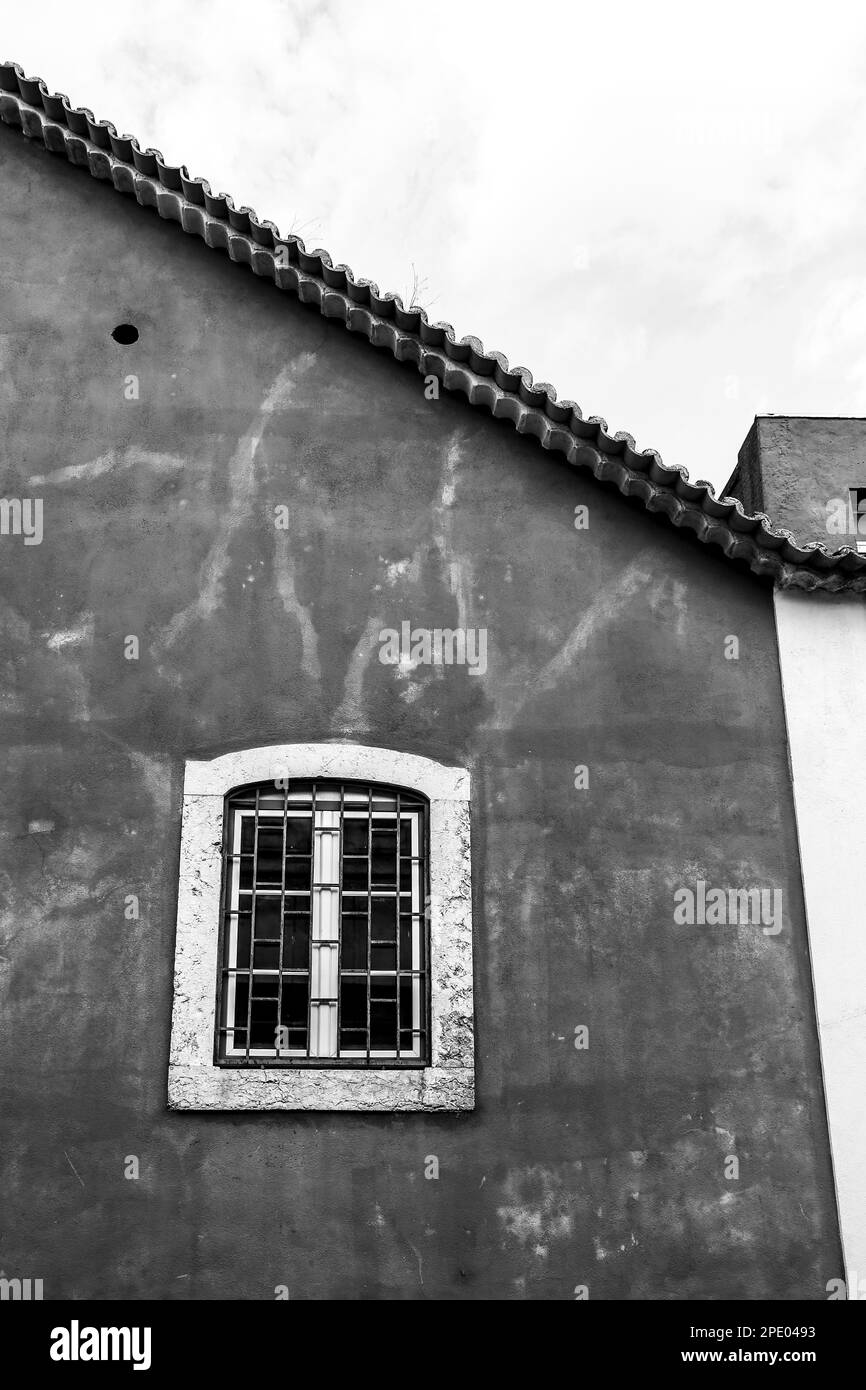 Old colorful and bright typical facade in Lisbon with beautiful white ...