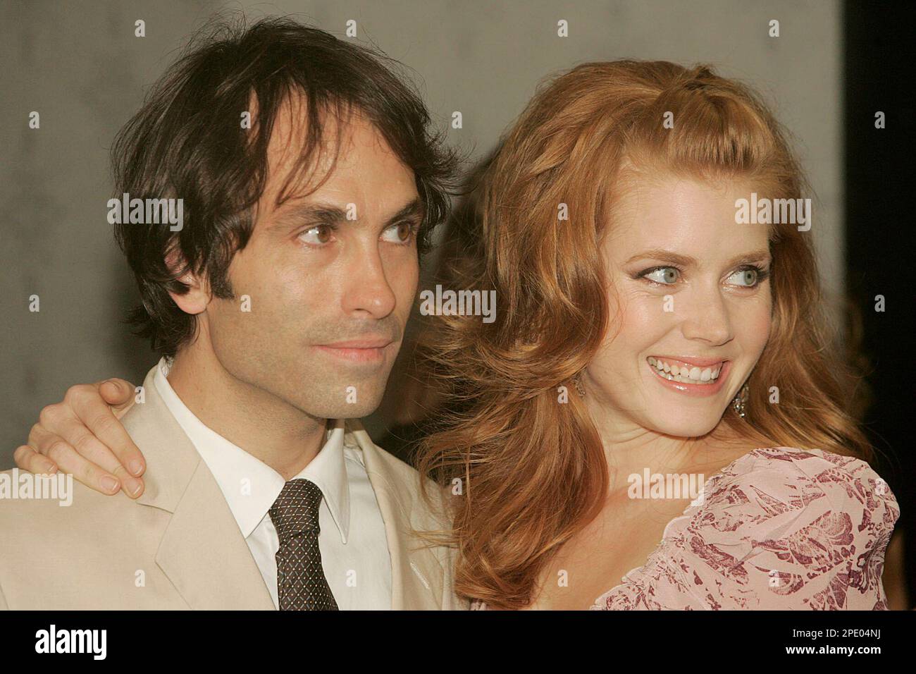 Amy Adams, right, poses with director Phil Morrison as they arrive for ...