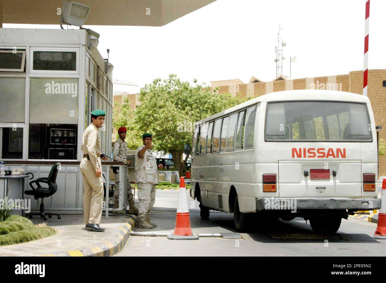 Saudi soldiers stand alert at a check point outside the King Faisal ...
