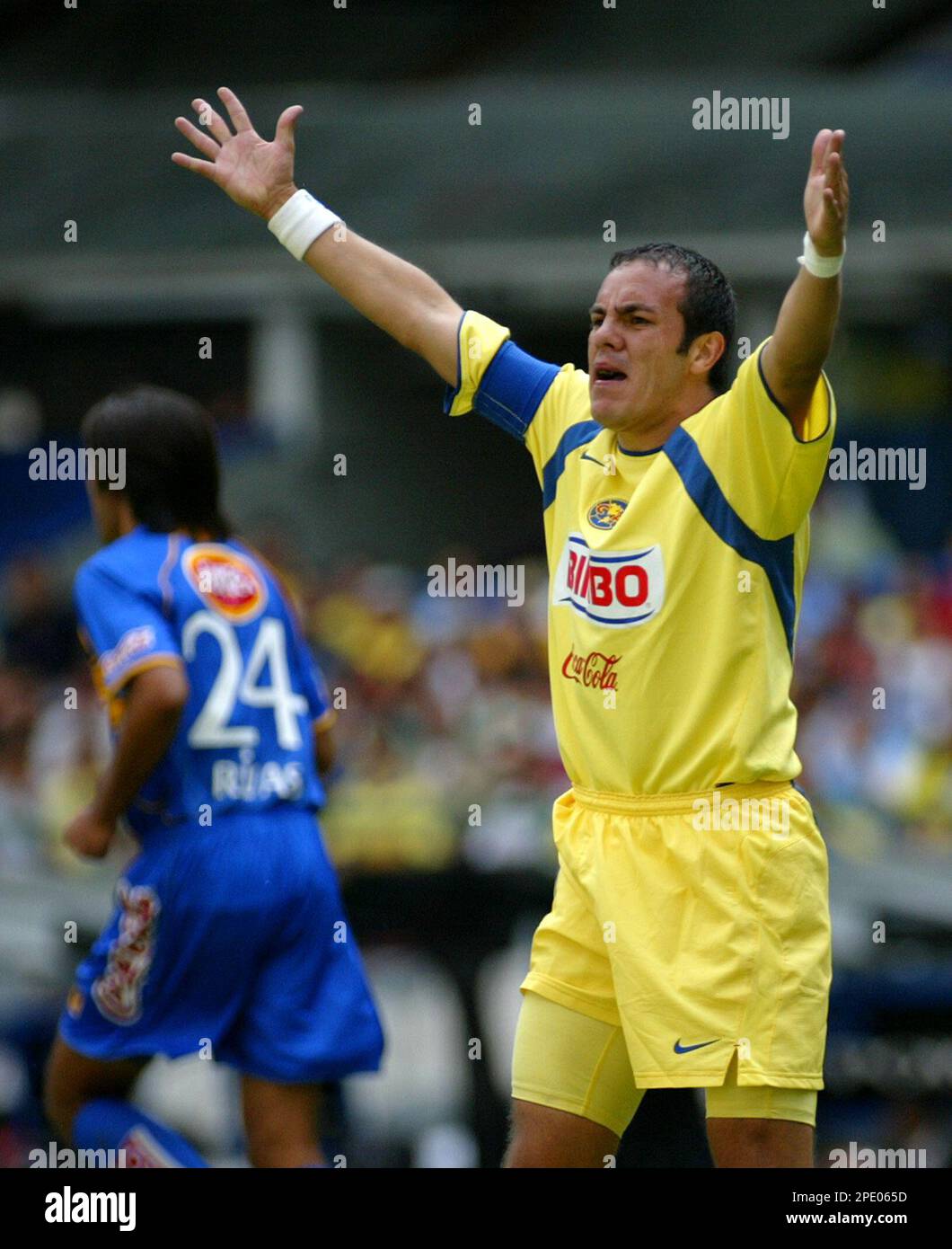 America's soccer player Cuauhtemoc Blanco, right, gestures to the ...