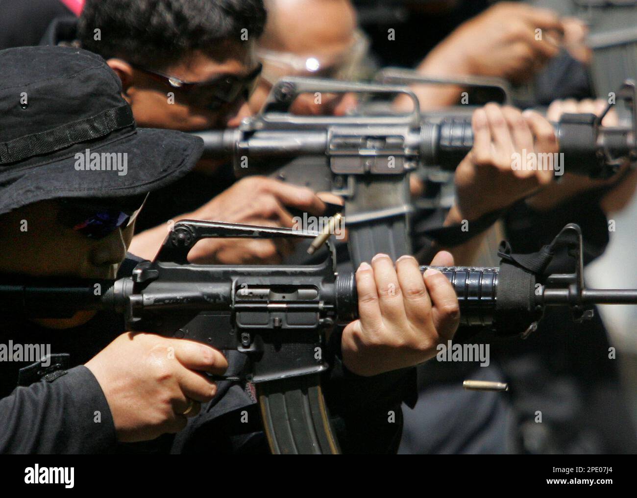 Philippine Police Special Weapons and Tactics group fire away using ...