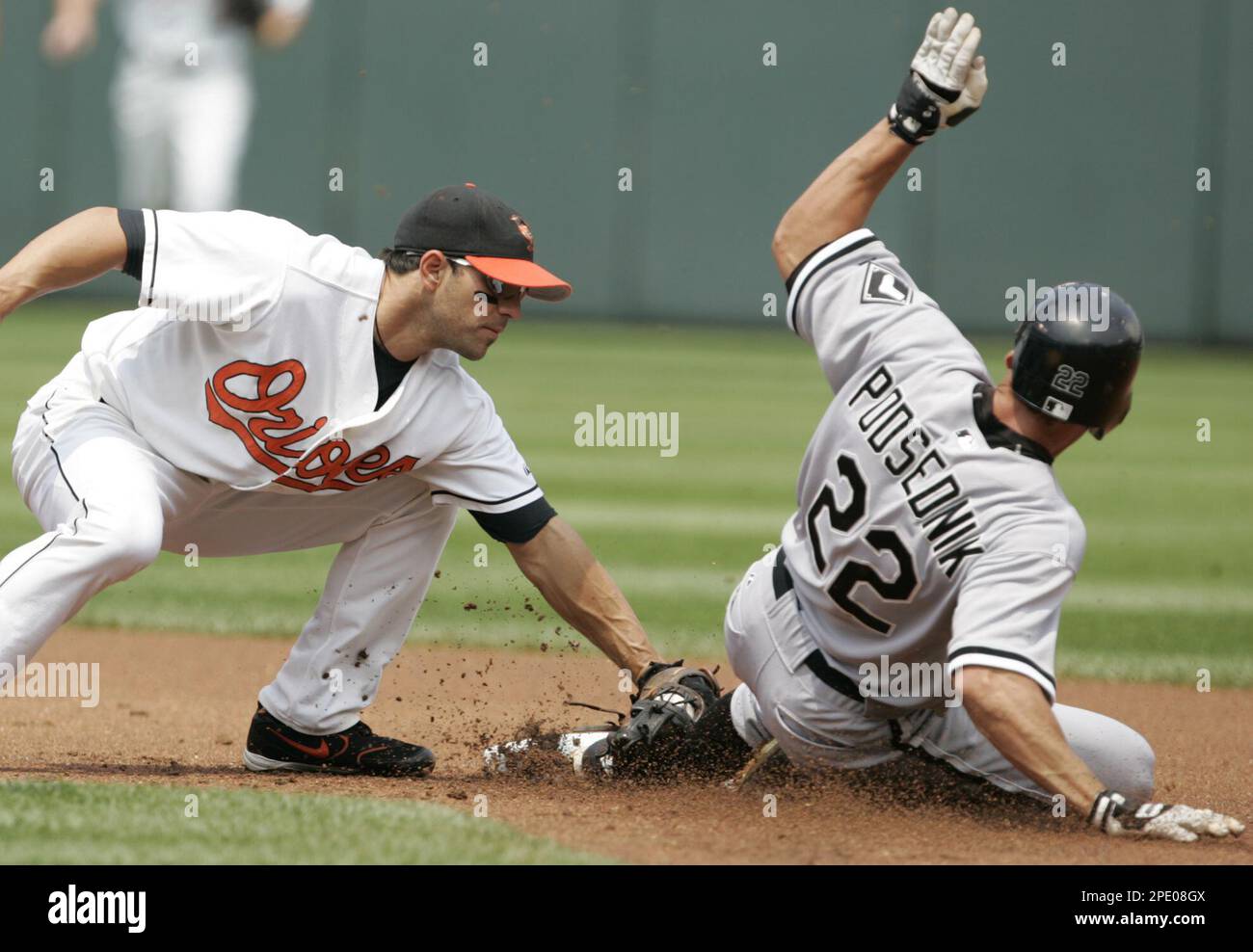 Baltimore Orioles second baseman Brian Roberts, left, tags out Chicago ...