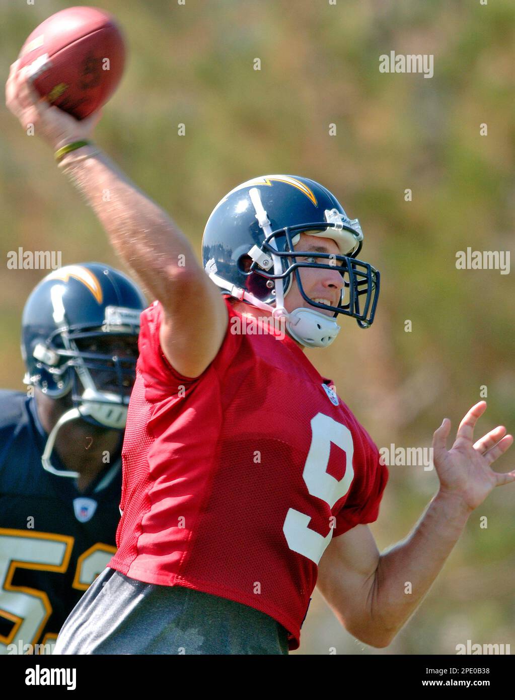 San Diego Chargers quarterback Drew Brees passes as linebacker Steve ...