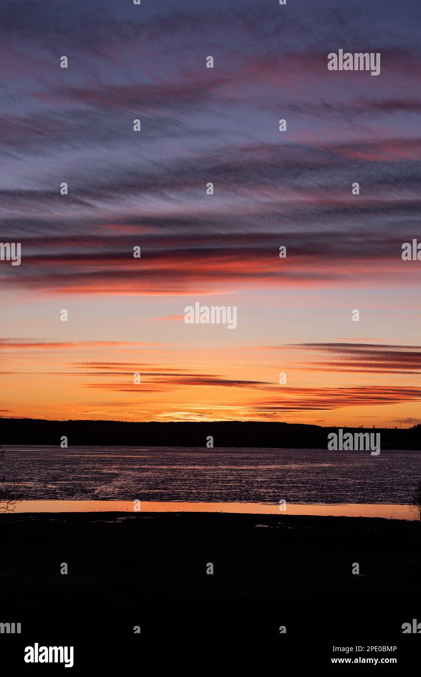 A stunning sunset captures the beauty of the horizon, with the sun ...