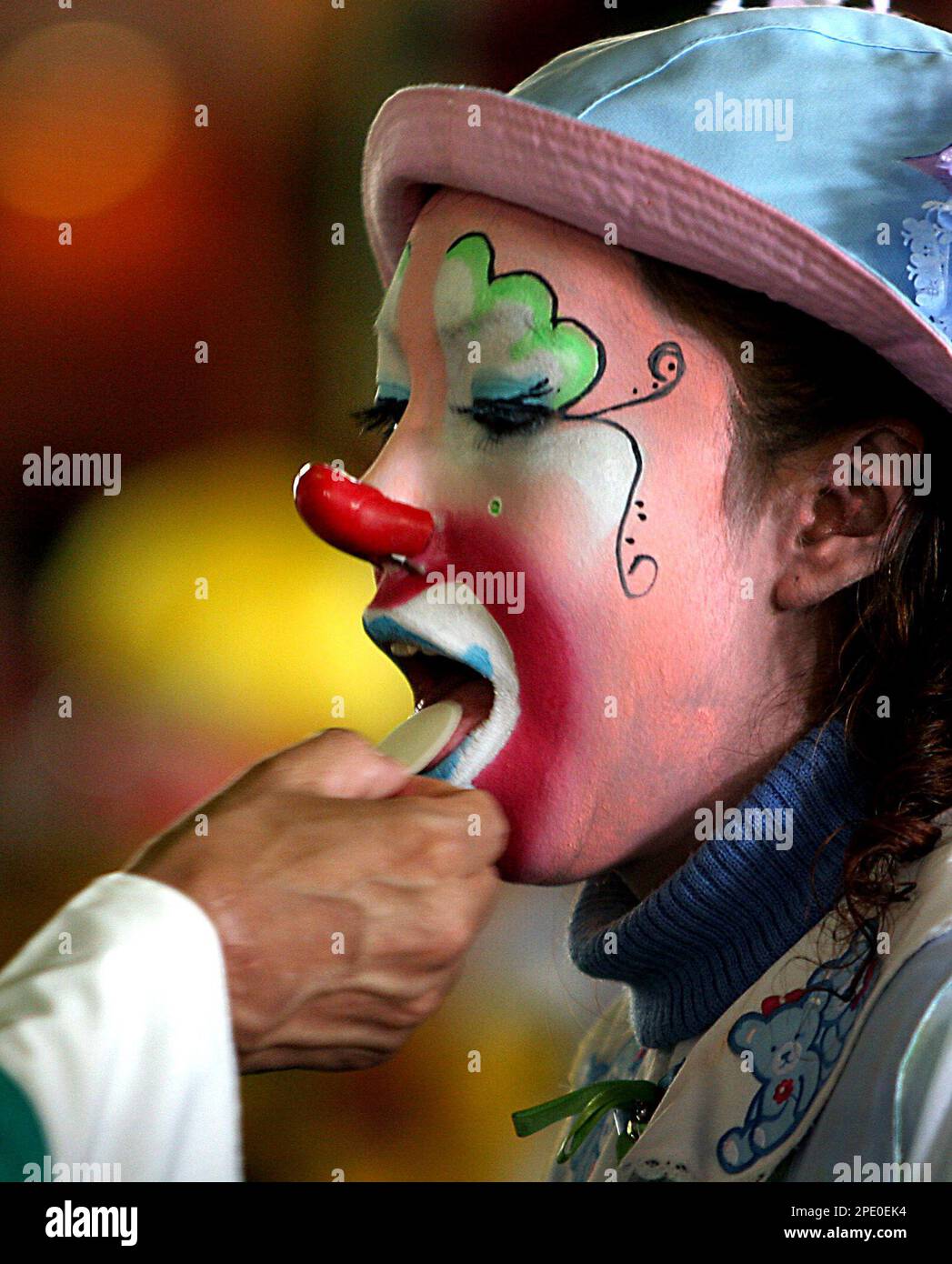 Maylen, 18, receives communion at the Basilica of Guadalupe in Mexico ...