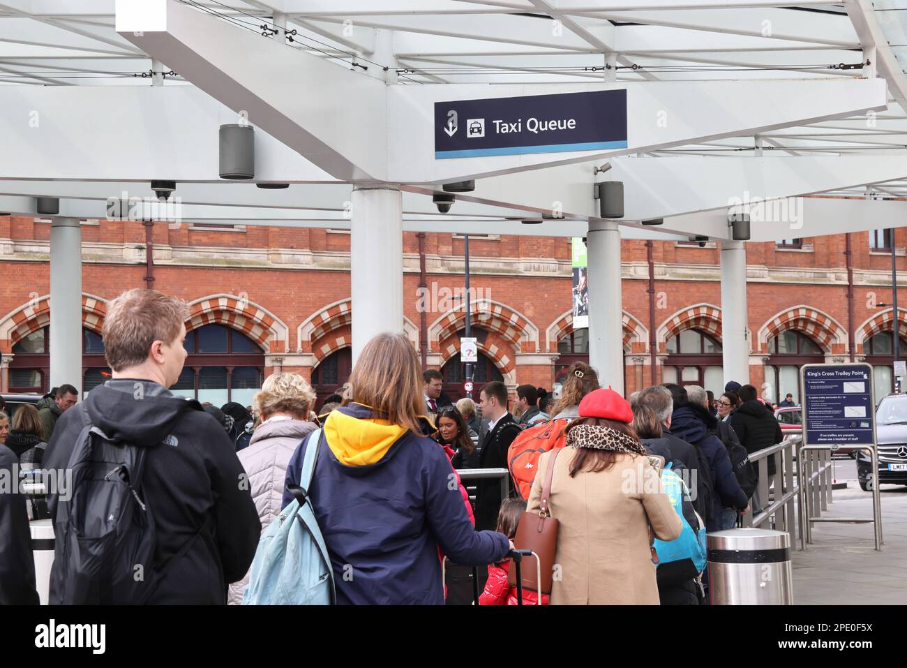 London, UK, 15th March 2023. Long queues for cabs outside Kings Cross ...