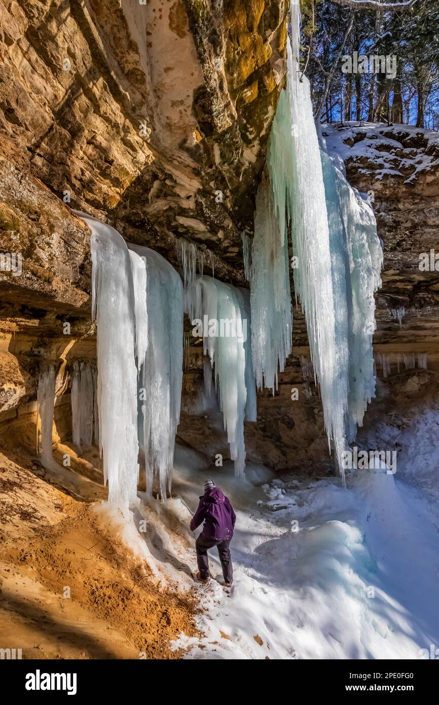 Karen Rentz at Amphitheater ice formation, with ice daggers overhead ...