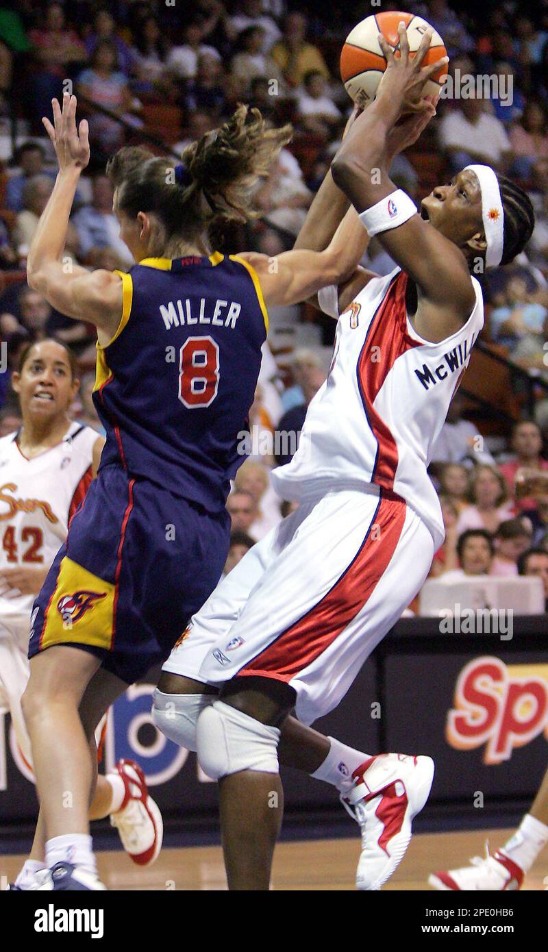 The Connecticut Sun's Taj McWilliams-Franklin tries to shoot as the ...