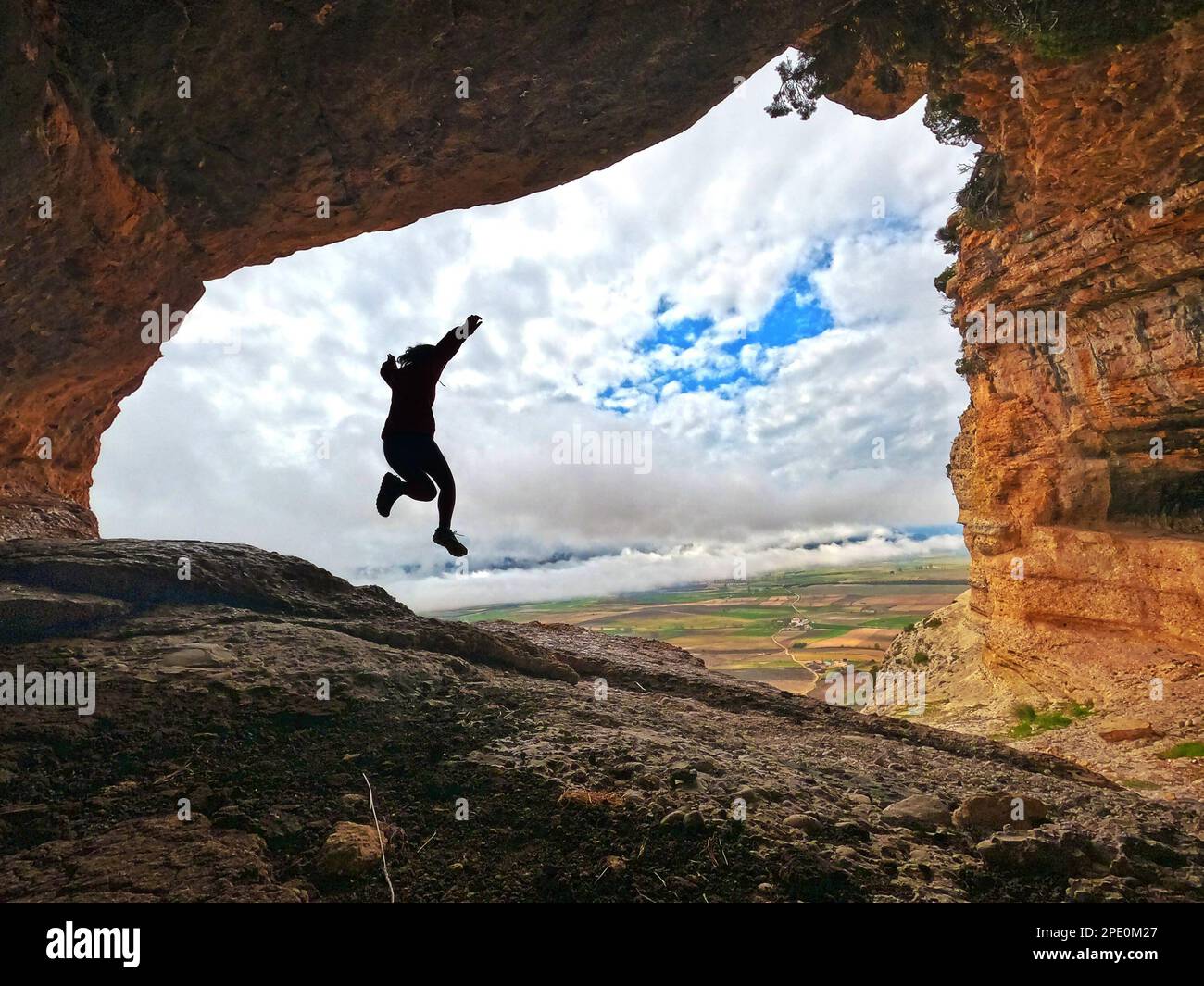 Woman hiking, walking at Cuevas de Zaen "Zaen caves" in Moratalla ...