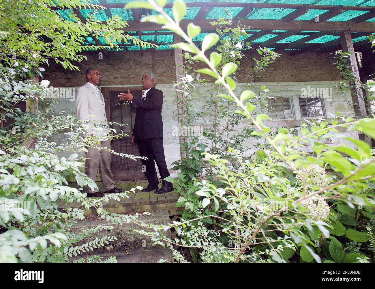 Georgia State Rep. Tyrone Brooks, right, talks with Walton County (Ga ...