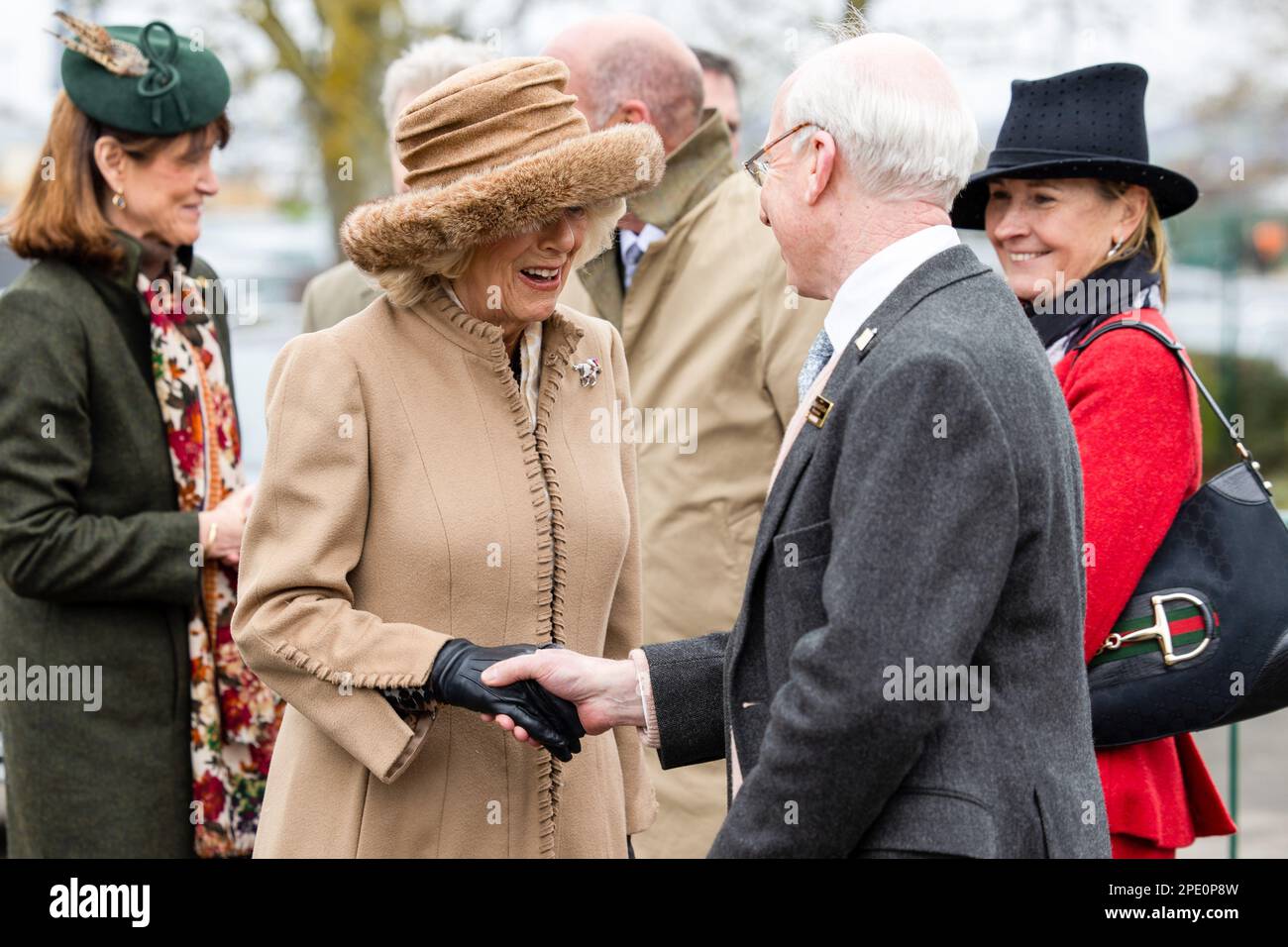 The Queen Consort, with Ian Renton, as she arrives at the Cheltenham ...