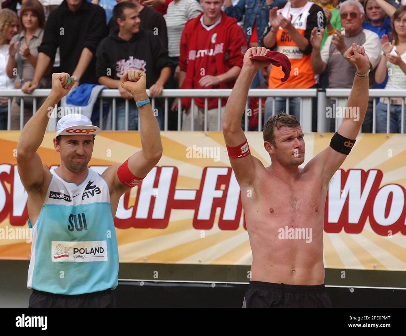 Swiss Markus Egger, left, and Martin Laciga react after winning their final match against ...