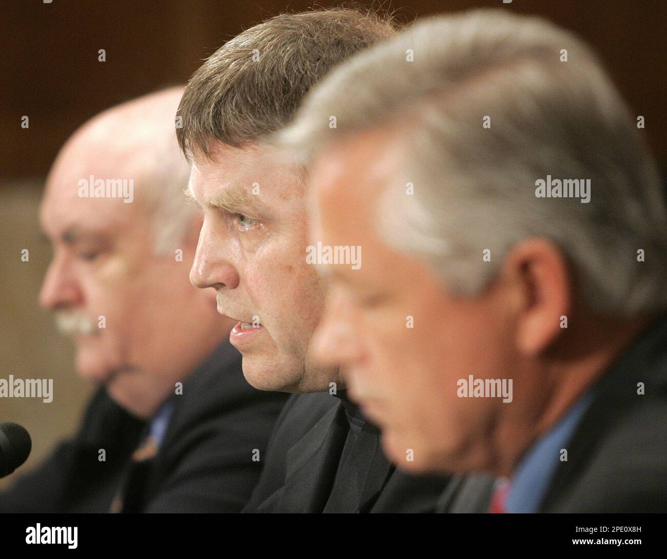 Former CIA analysts, Larry Johnson, center, with former analyst and ...