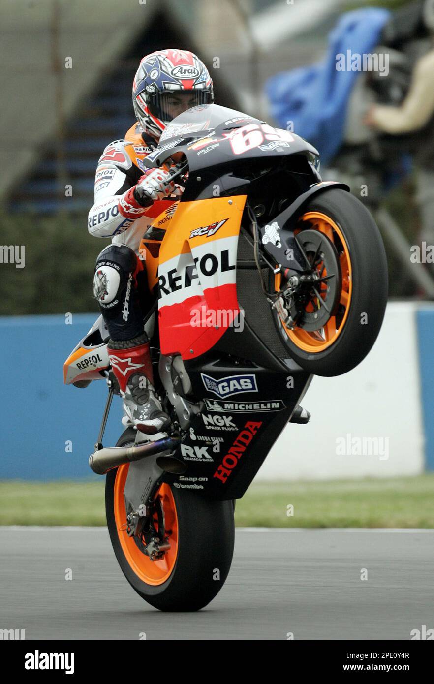 America's Nicky Hayden entertains the crowd on his Repsol Honda during ...