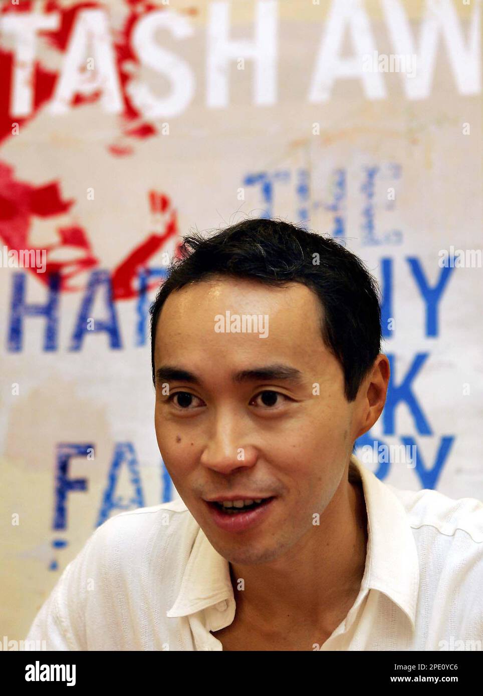 Author Tash Aw speaks during an interview by The Associated Press ...