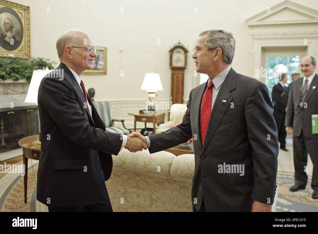 In this photograph provided by the White House, President Bush welcomes ...