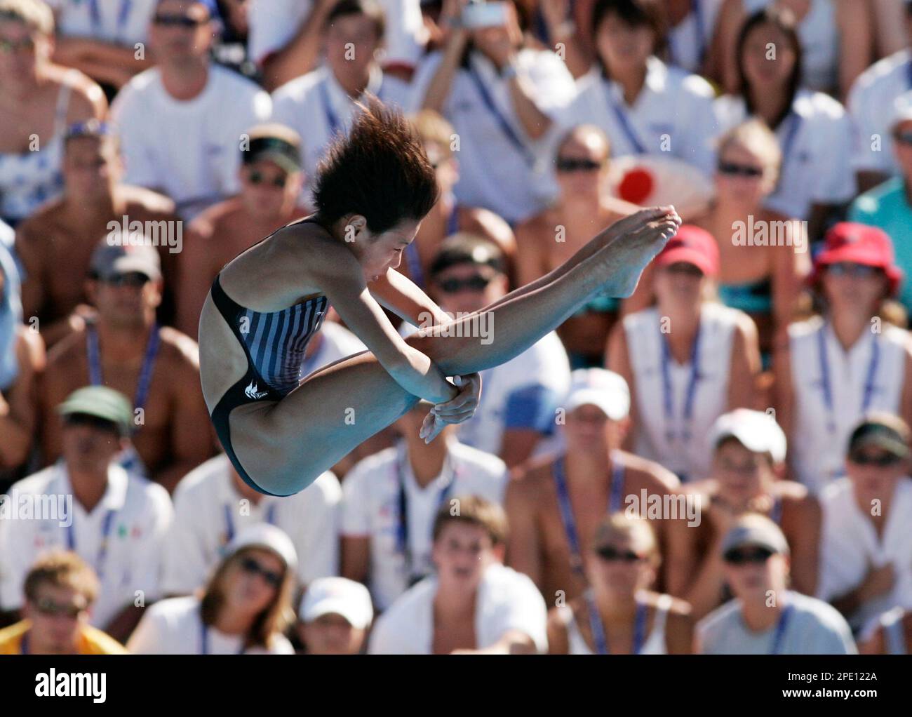 Tong Jia from China performs a dive on her way to winning the bronze ...