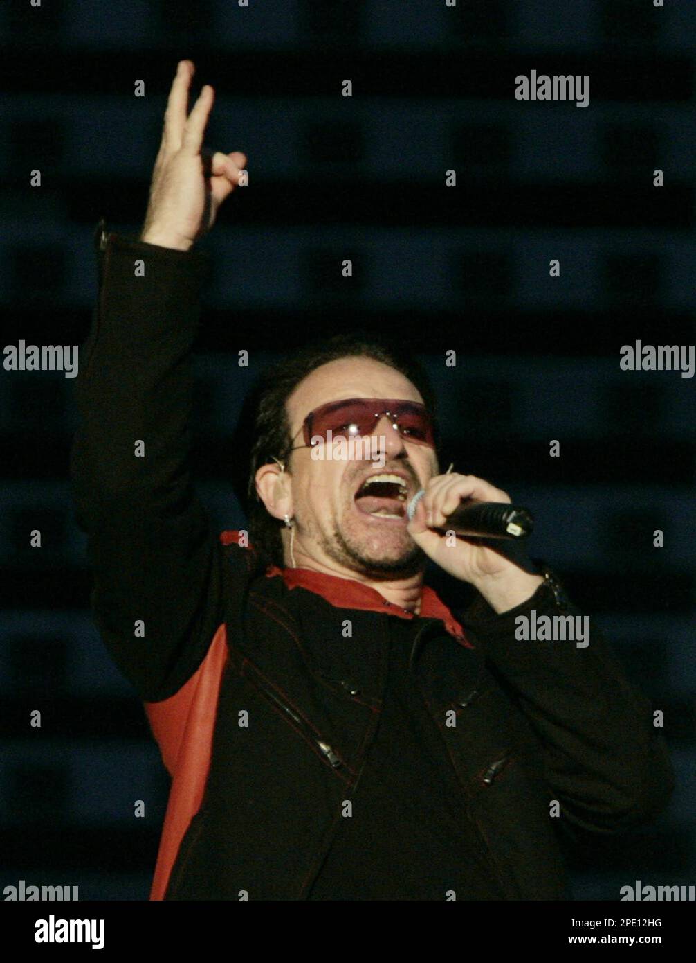 Singer Bono of Irish rock group U2 performs on the stage during their ...