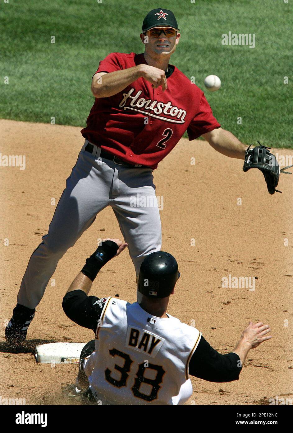 Houston Astros' second baseman Chris Burke (2) turns a seventh inning ...
