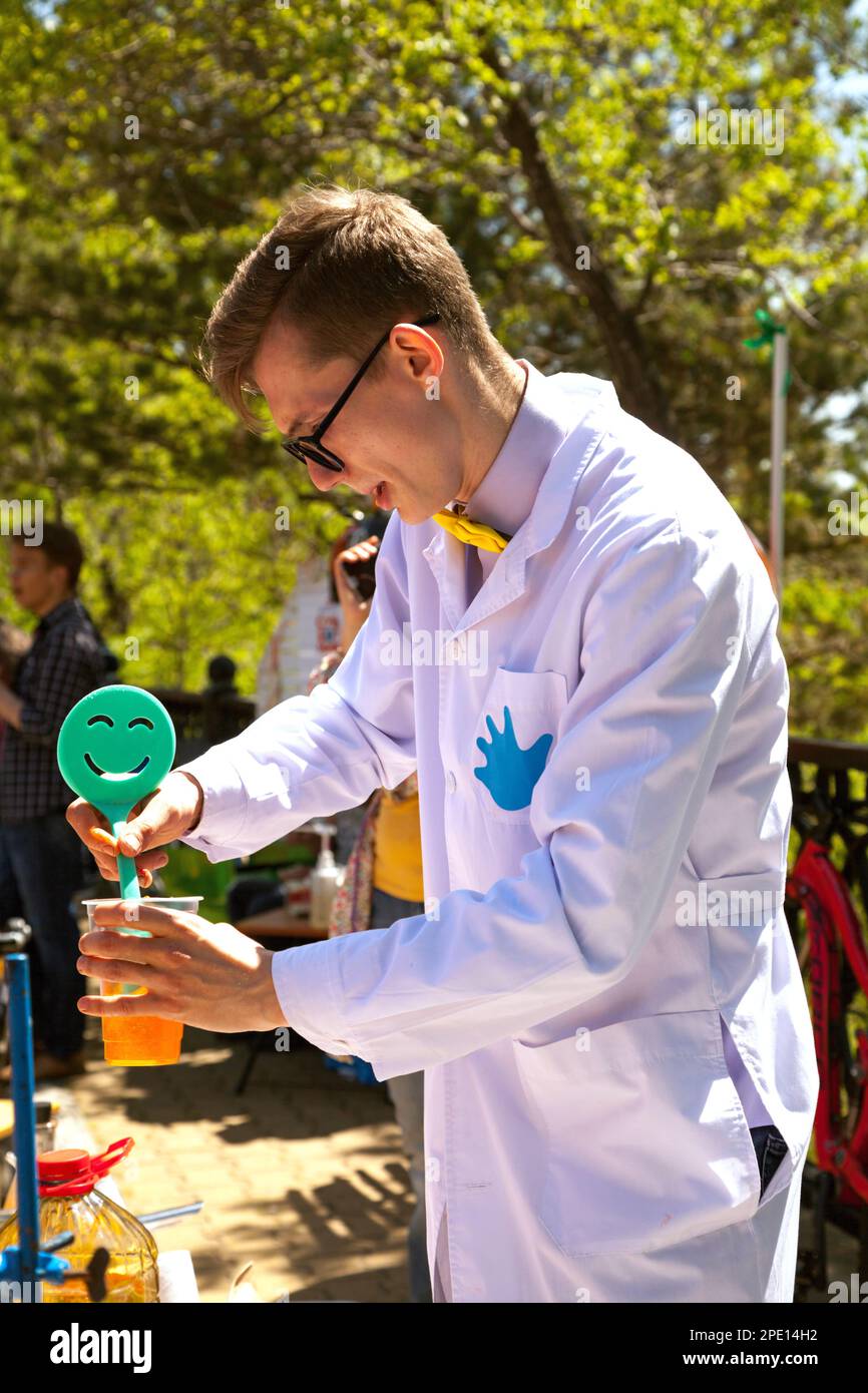 Khabarovsk, Russia - May 20, 2017: Young smart professor carrying out ...