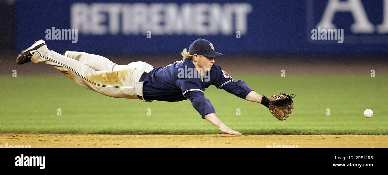 San Diego Padres shortstop Khalil Greene dives for a ball hit up the ...