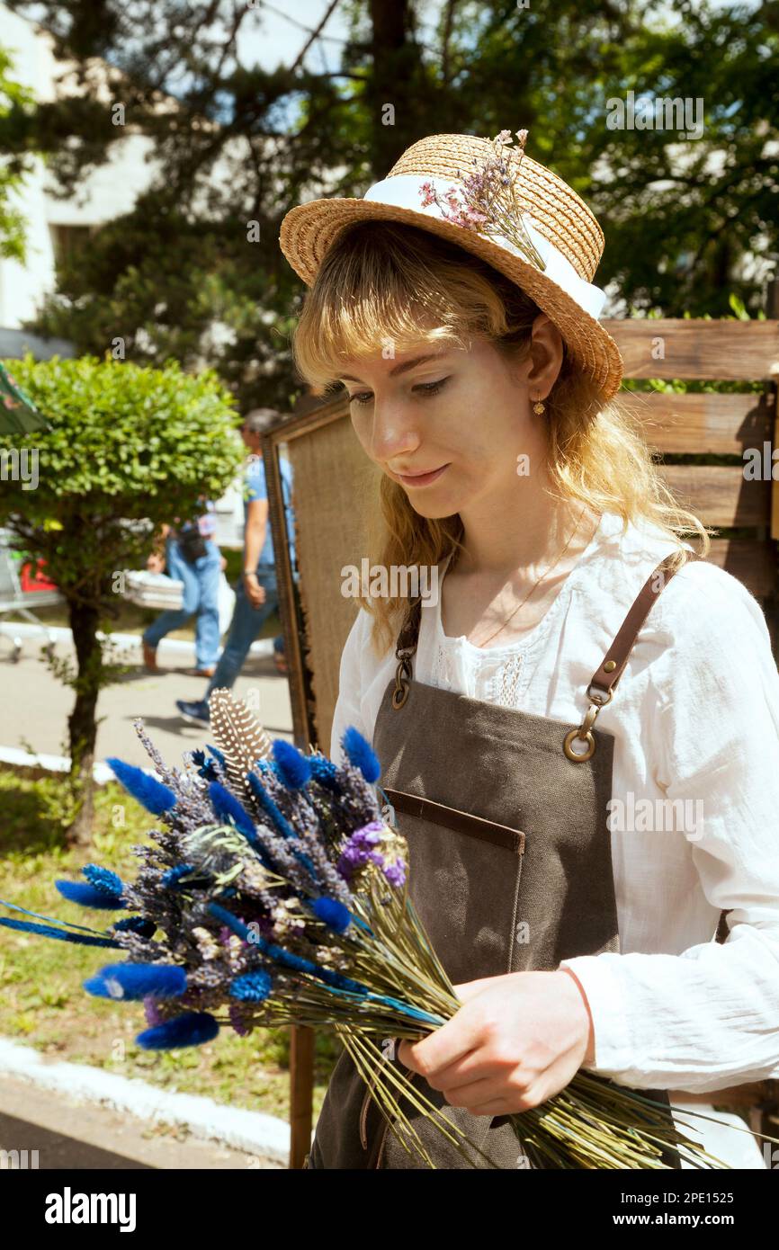Khabarovsk, Russia - June 11, 2018: Young woman wearing farmer outfit ...