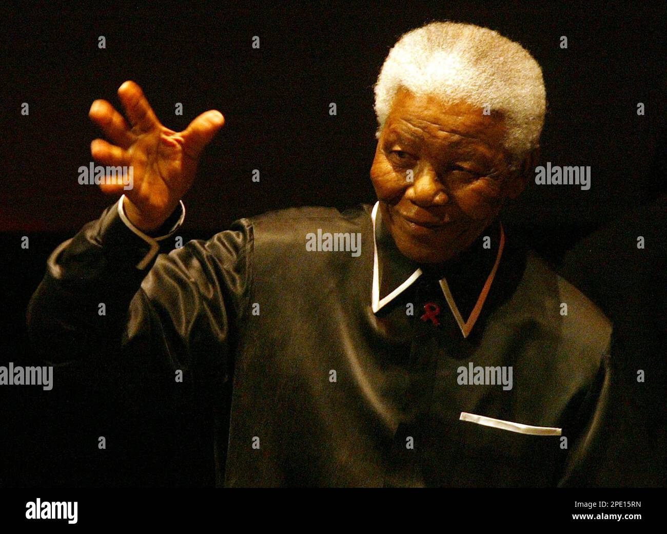 Former South African President Nelson Mandela, waves after the Nelson ...