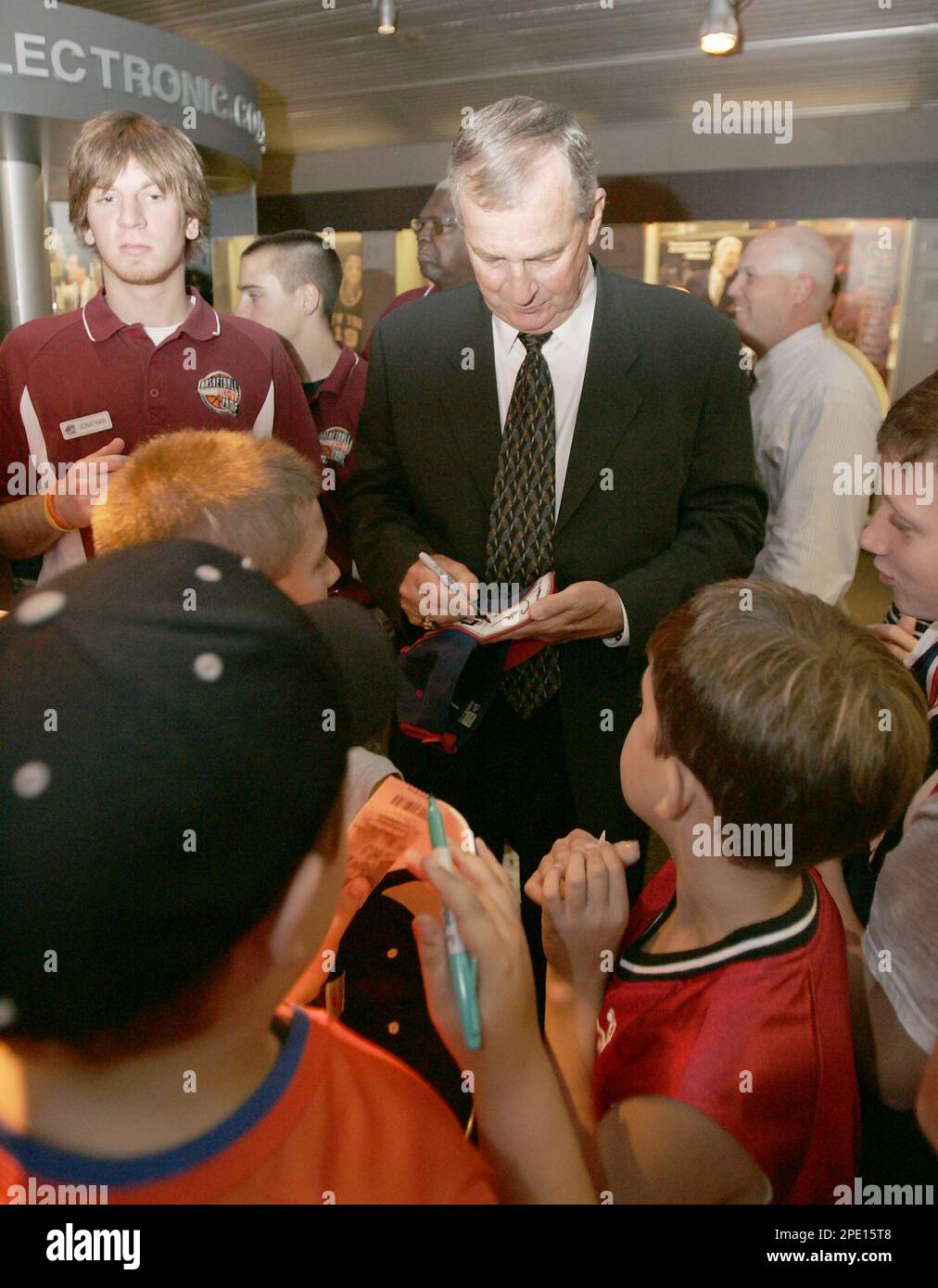 University of Connecticut head men's basketball coach Jim Calhoun signs ...