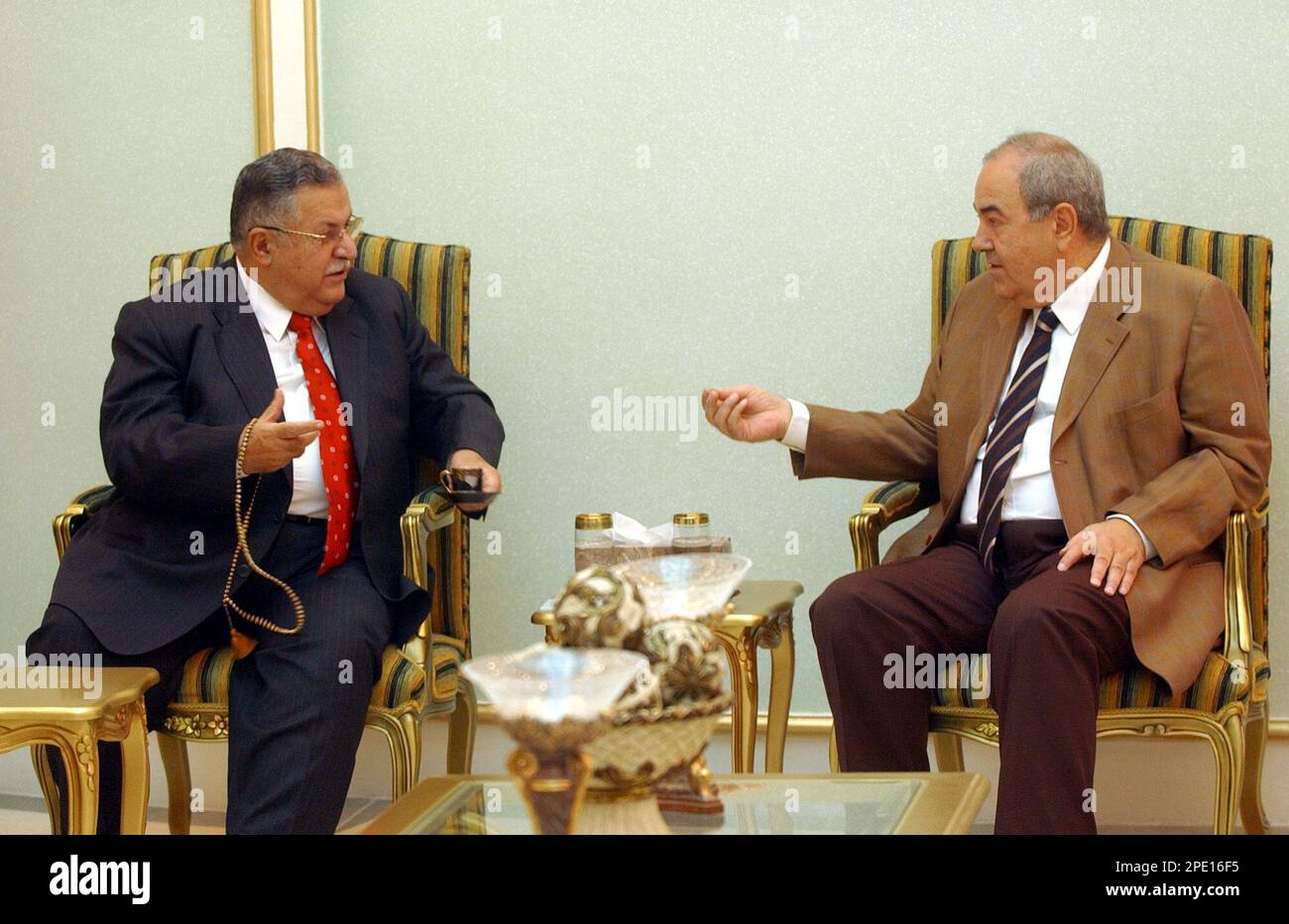 President Jalal Talabani, left, meets with Former Prime Minister Ayad ...
