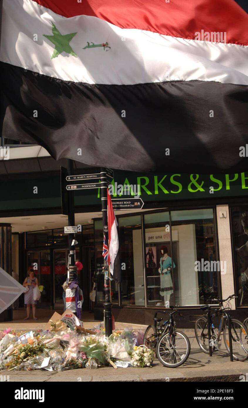 Iraqi flags fly from posts, along with a British union flag, above a ...